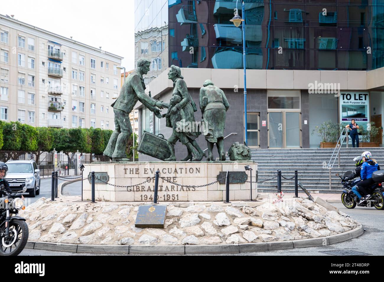 A memorial statue for the Evacuation of the Gibraltarians Stock Photo ...