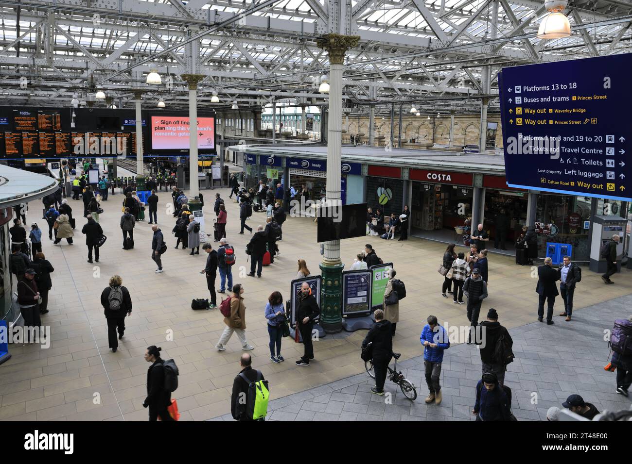Passengers inside Edinburgh Waverley station; Edinburgh City, Scotland ...