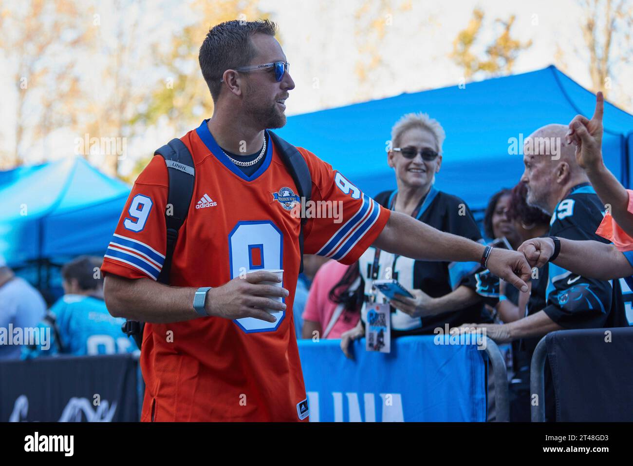 Carolina Panthers wide receiver Adam Thielen (19) fists bumps fans as ...
