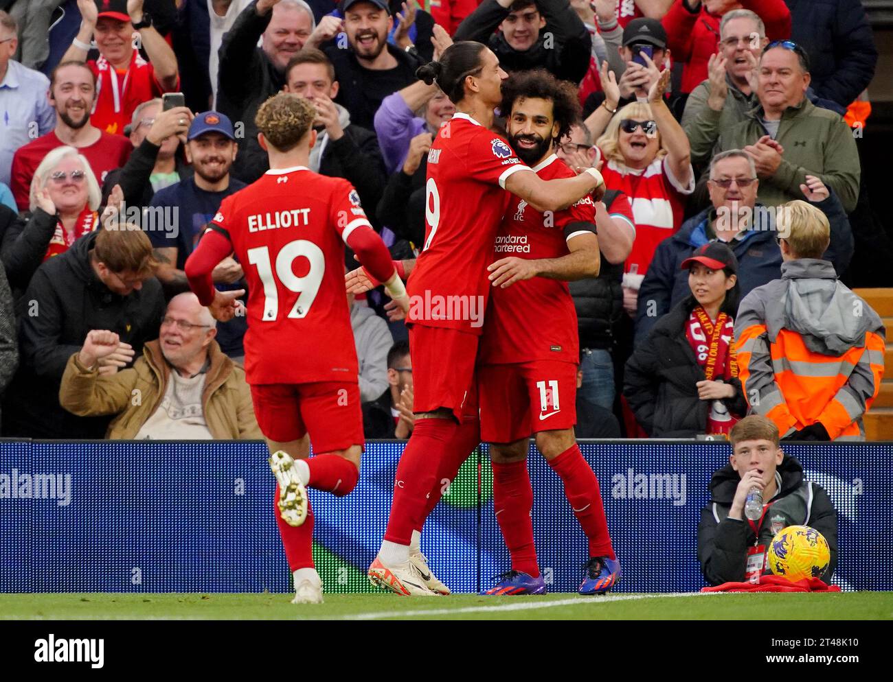 Liverpool's Mohamed Salah (right) celebrates with Darwin Nunez and ...