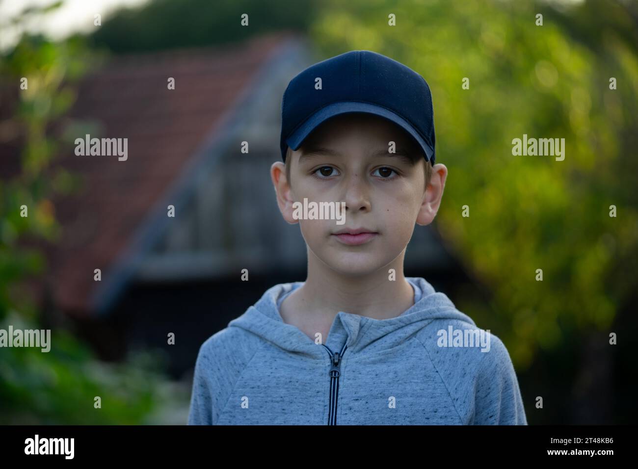 Cute little curious boy in green nature waiting for magic. Inquisitive ...