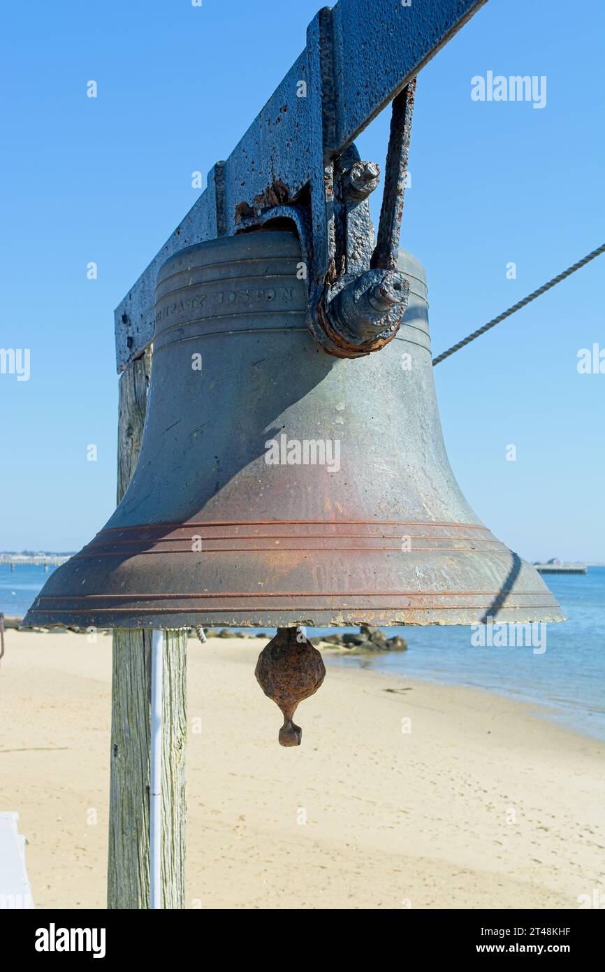 Old bronze ships bell cast at Henry N. Hooper and Company mounted on ...