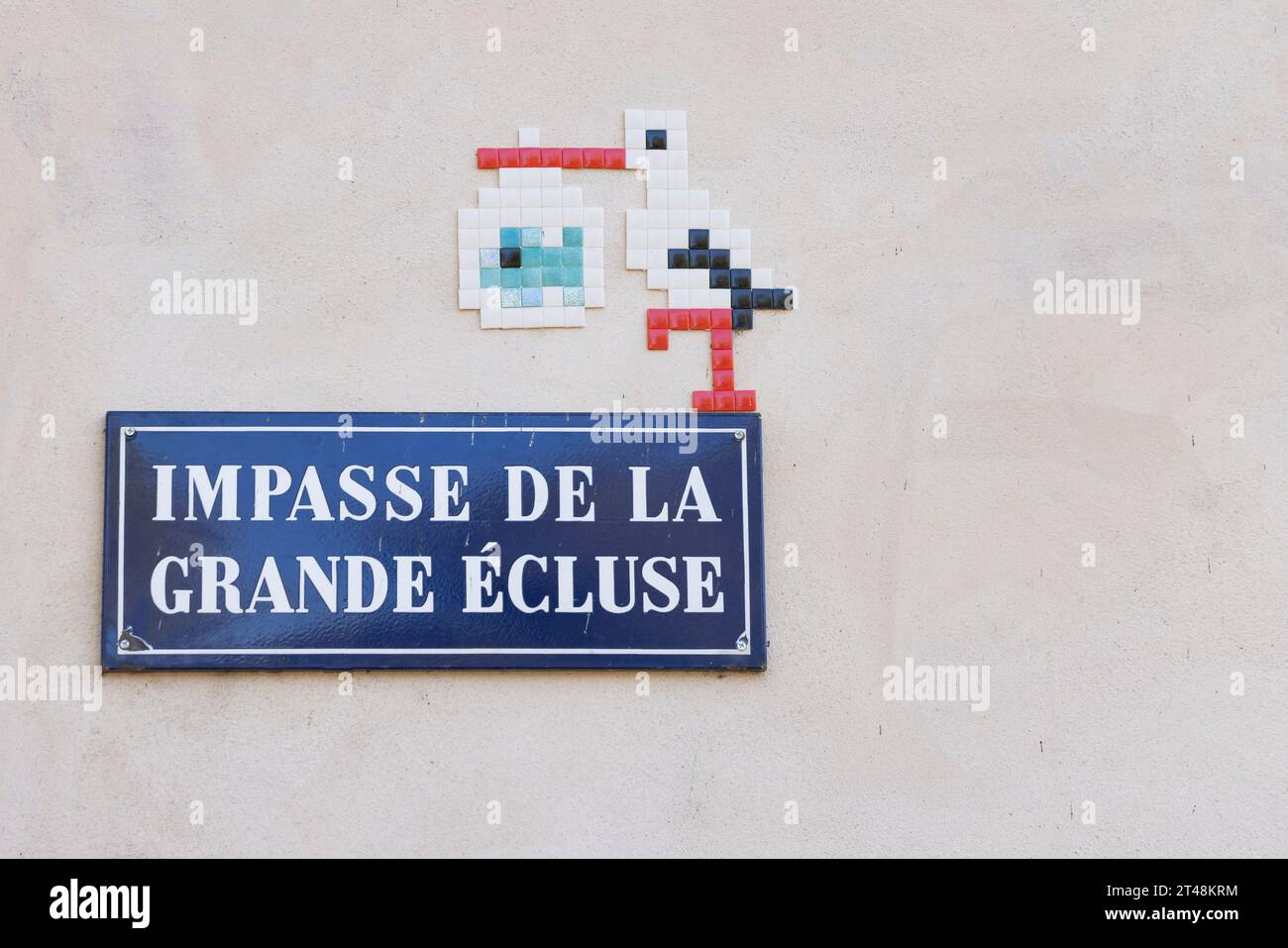 Strasbourg, France - October 16, 2023: Street name sign with symbol of ...