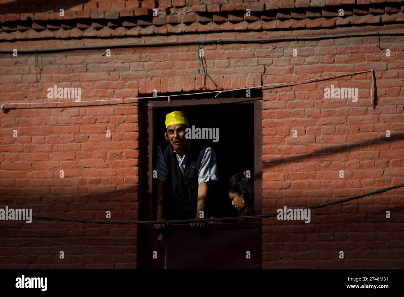 Kathmandu, Nepal. 29th Oct, 2023. A man watches the celebration of the ...