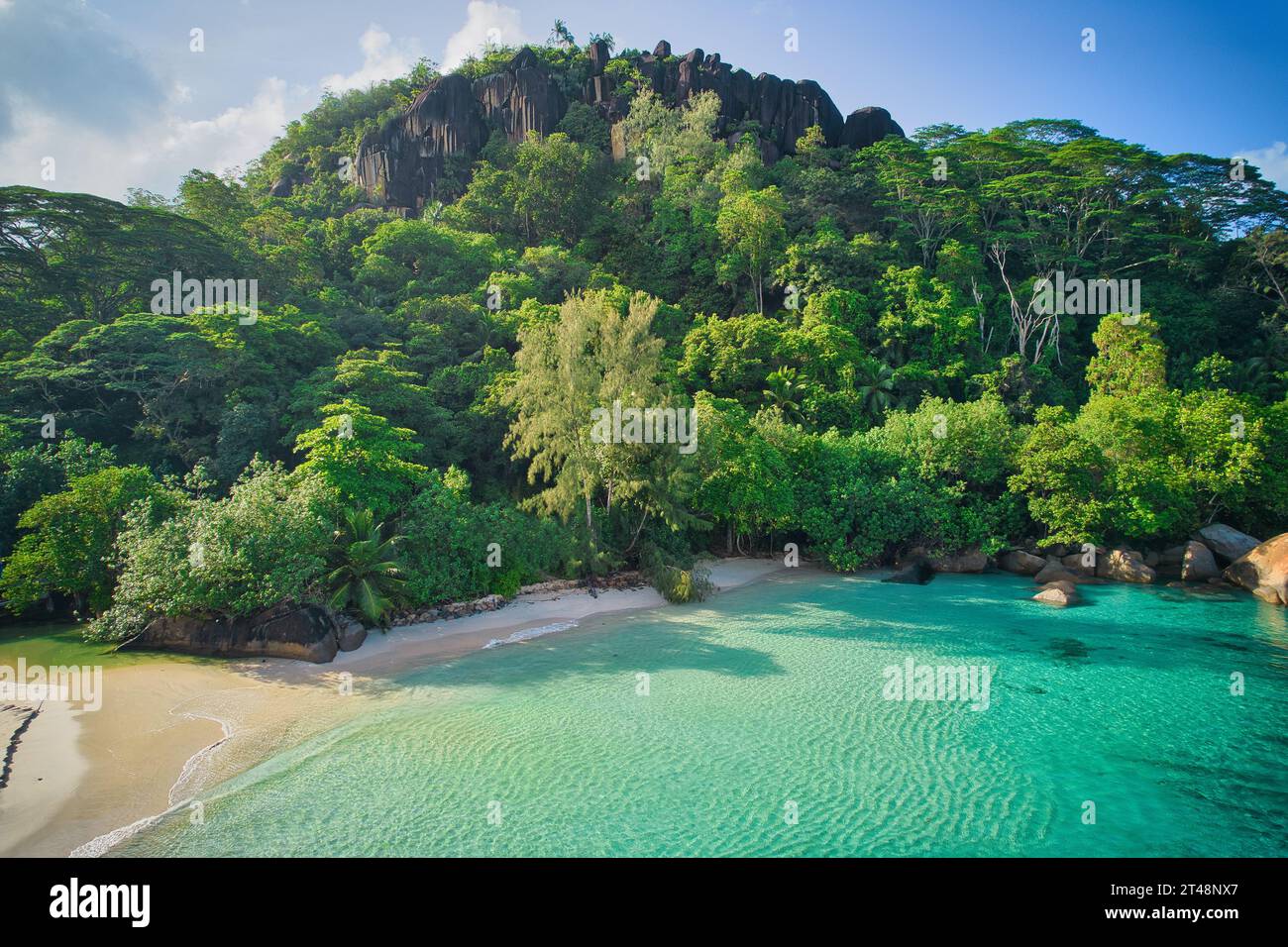 Drone bird eye view at Anse solei beach, bridge over river within forest Mahe Seychelles Stock ...