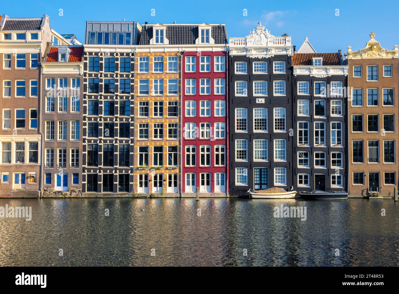 Iconic view of traditional old buildings in Amsterdam, the Netherlands ...