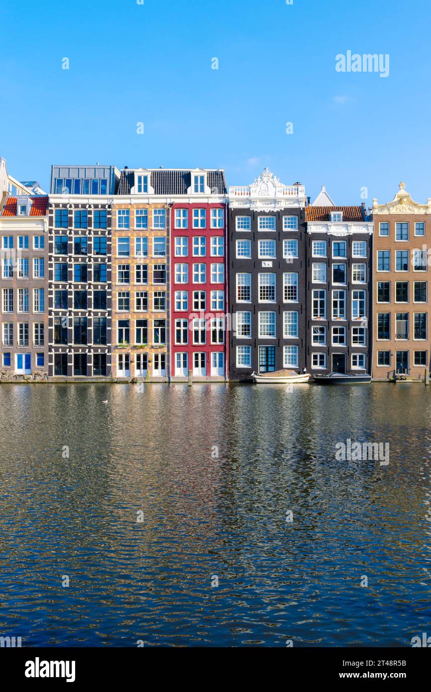 Iconic view of traditional old buildings in Amsterdam, the Netherlands ...