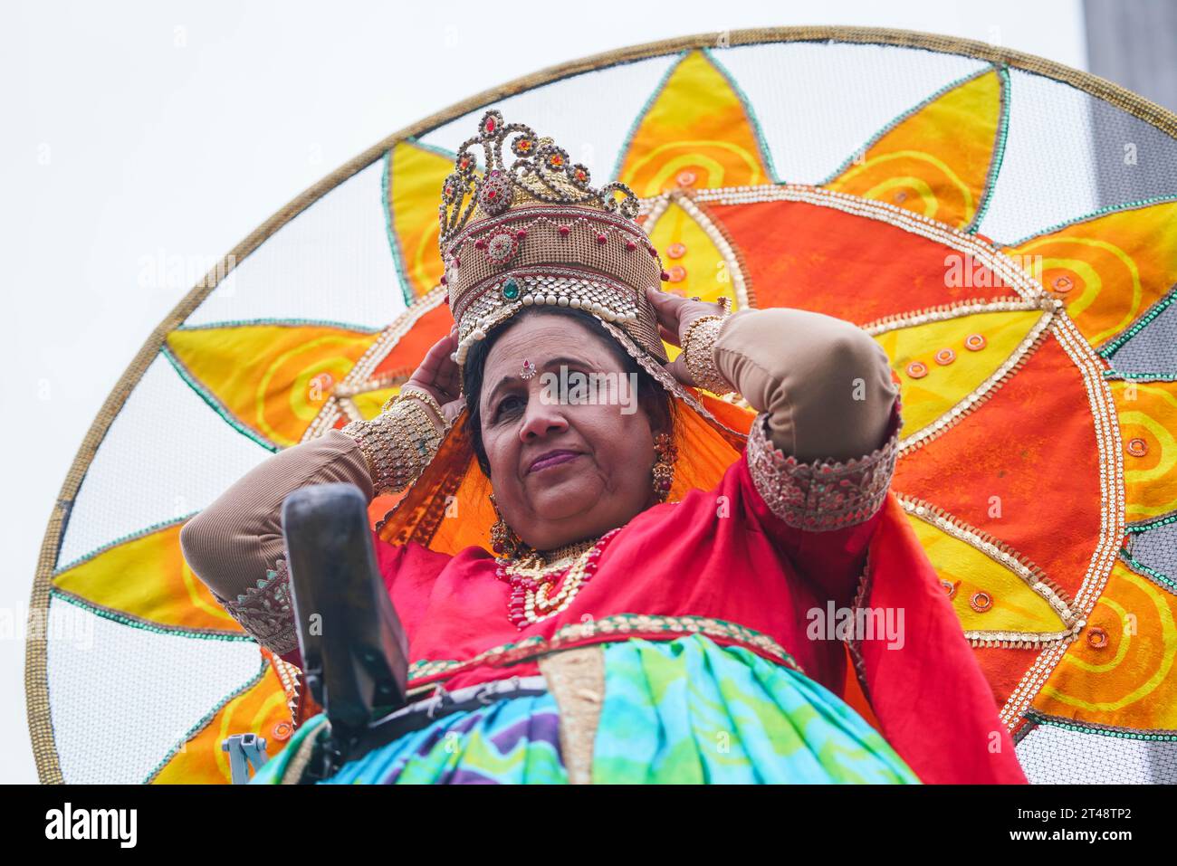London, UK. 29 October 2023.. A performer representing Surya (also ...