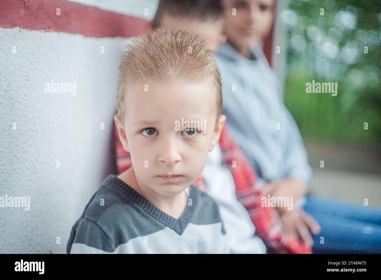 Cute little curious boy in green nature waiting for magic. Inquisitive ...