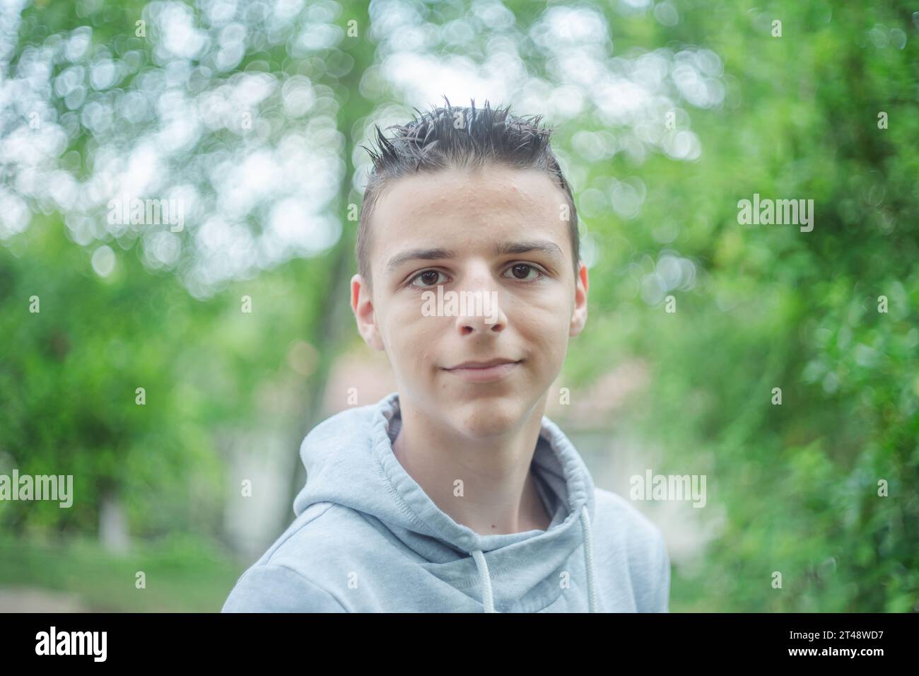 Cute little curious boy in green nature waiting for magic. Inquisitive ...