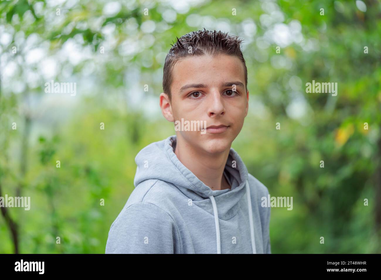 Cute little curious boy in green nature waiting for magic. Inquisitive ...