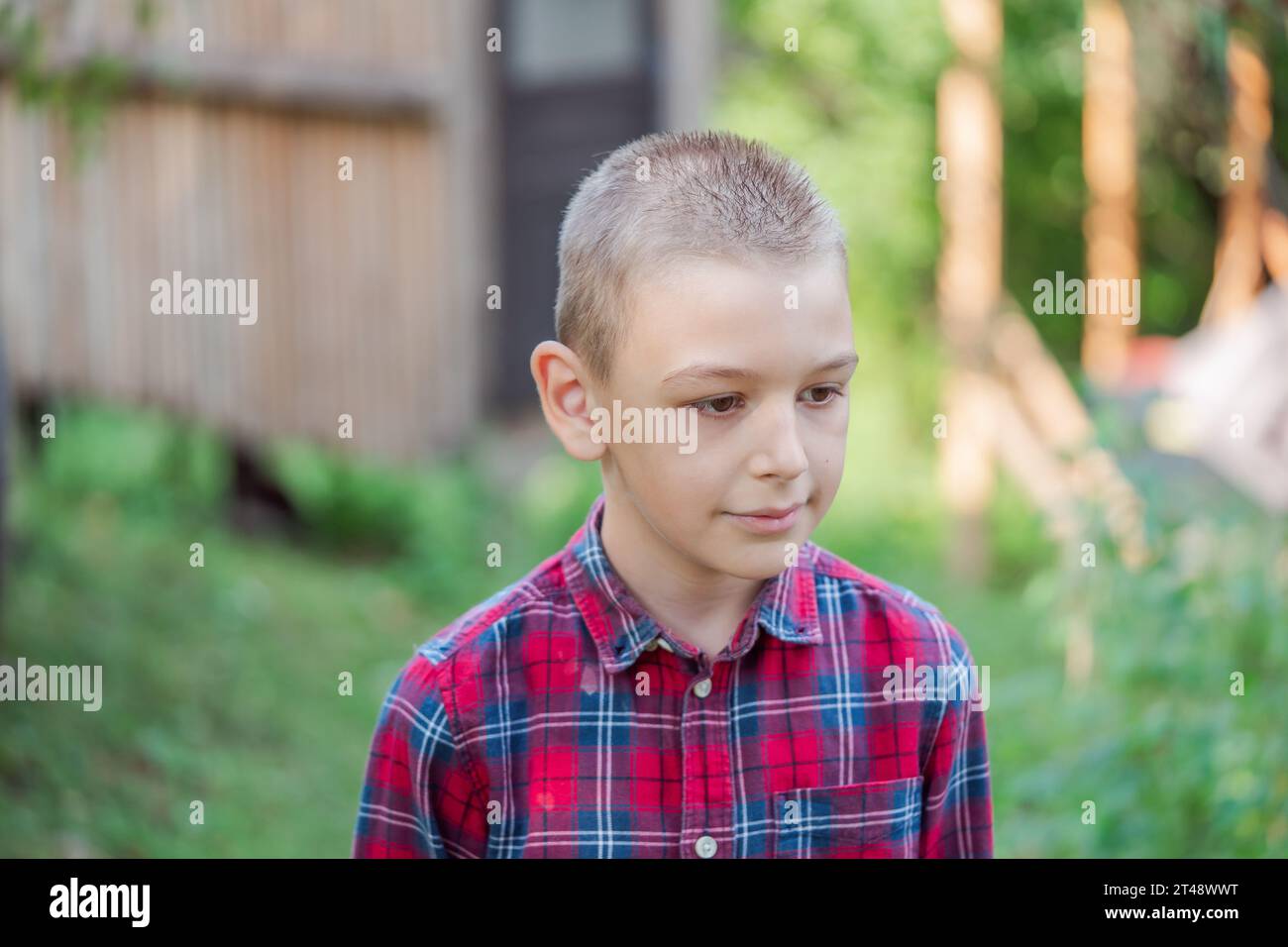 Cute little curious boy in green nature waiting for magic. Inquisitive ...