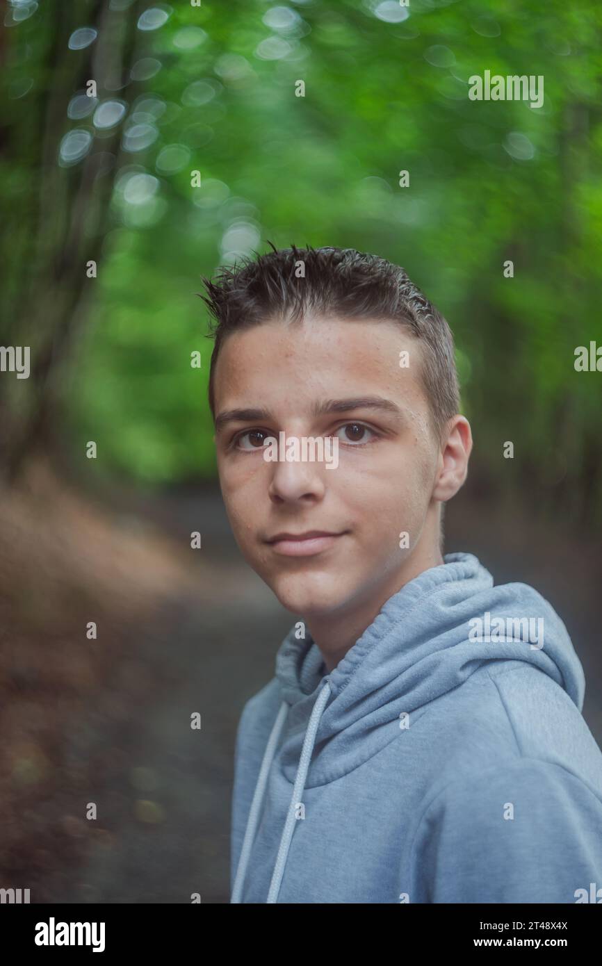 Cute little curious boy in green nature waiting for magic. Inquisitive ...