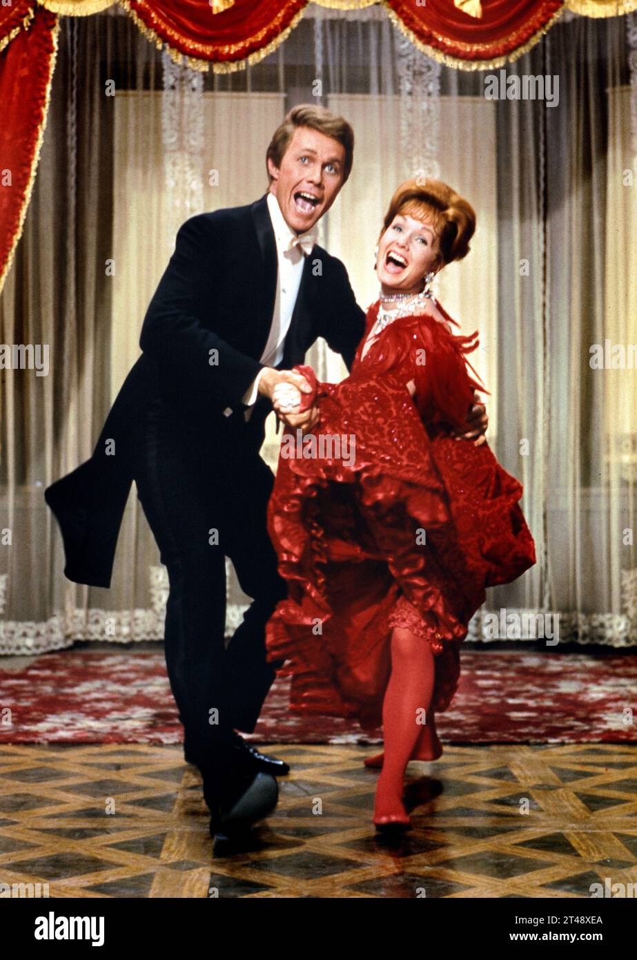 Harve Presnell, Debbie Reynolds, "The Unsinkable Molly Brown" (1964). Photo credit: MGM (File ...