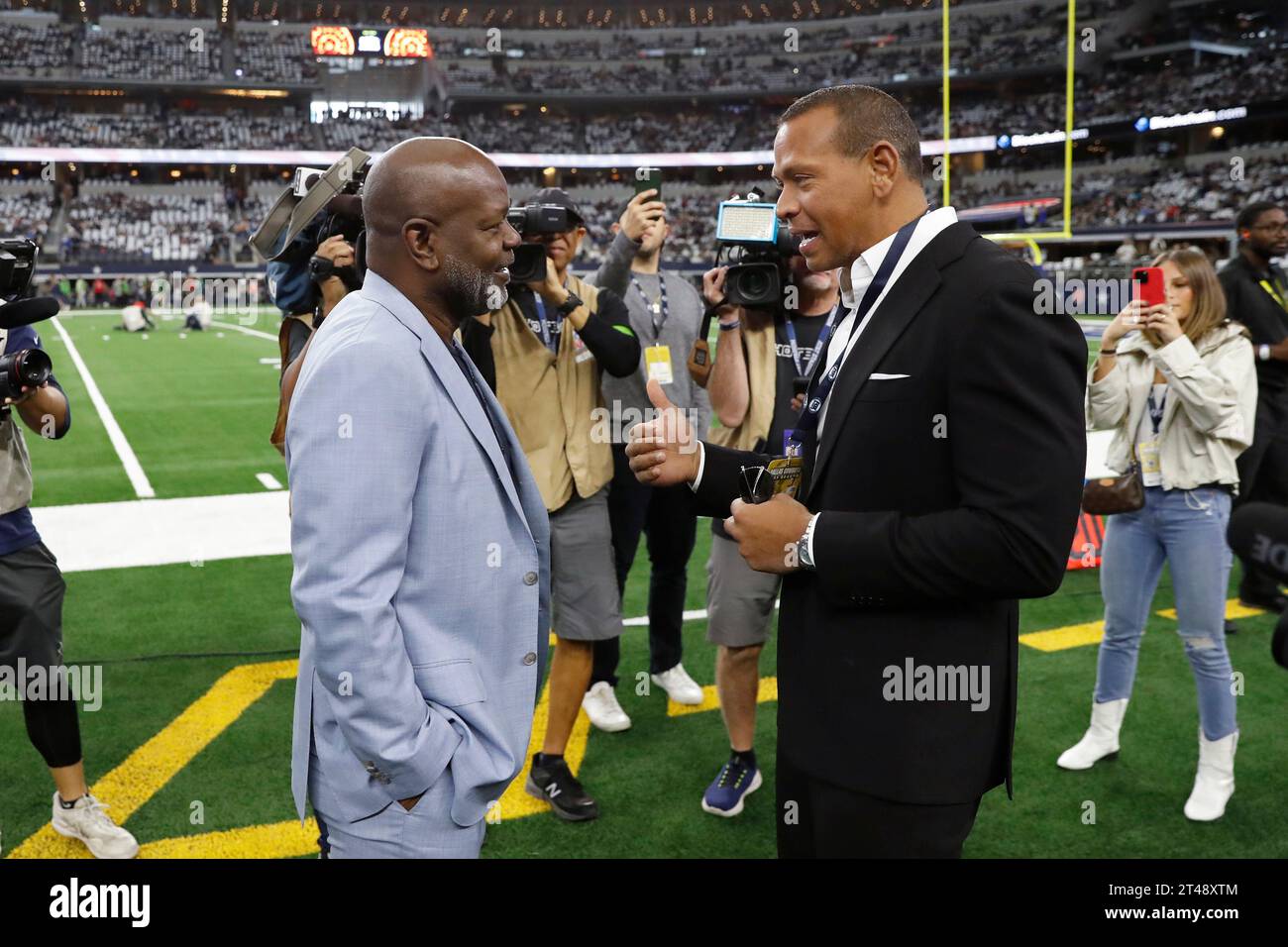 Former Dallas Cowboys running back Emmett Smith, left, and former MLB ...