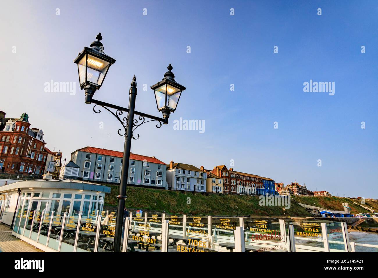 A mixture of colourful architecture on the seafront above the pier in ...
