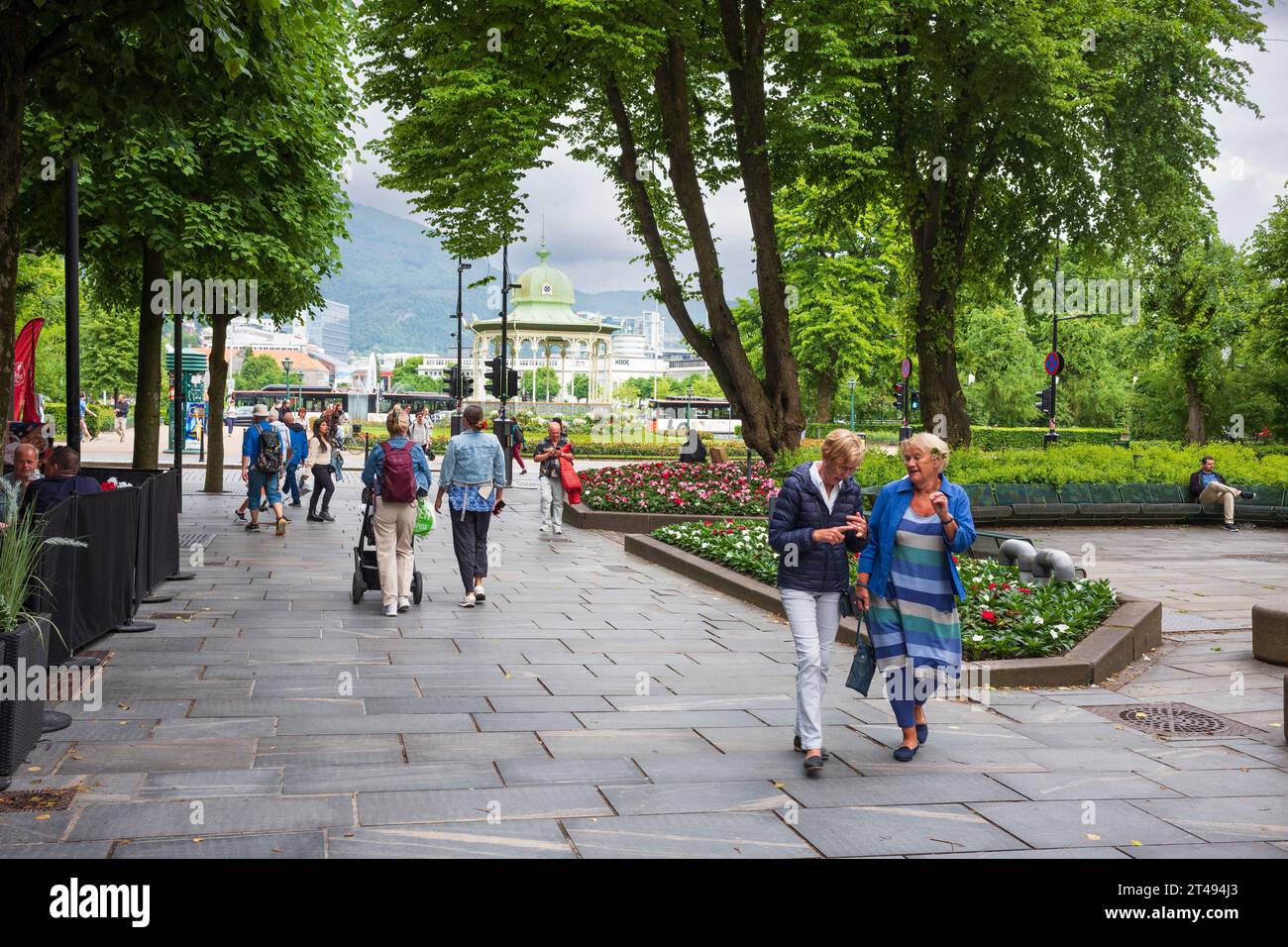 Bergen, Norway, June 22, 2023: Pedestrains walk the city streets of ...
