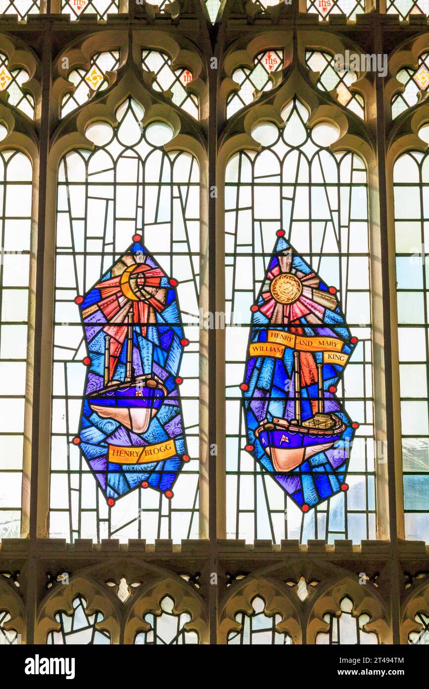 Colourful stained glass windows featuring lighthouses and lifeboats in ...