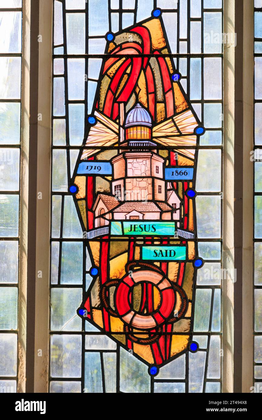Colourful stained glass windows featuring lighthouses and lifeboats in ...