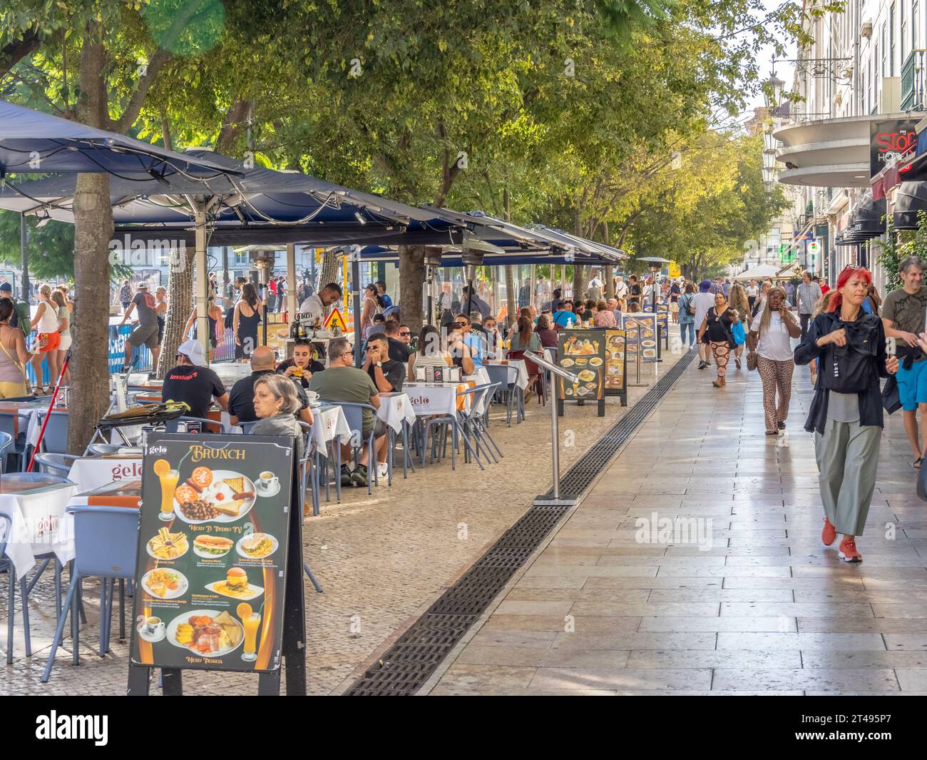 Outdoor street cafes on Rue Augusta a pedestrian avenue in the Baixa ...