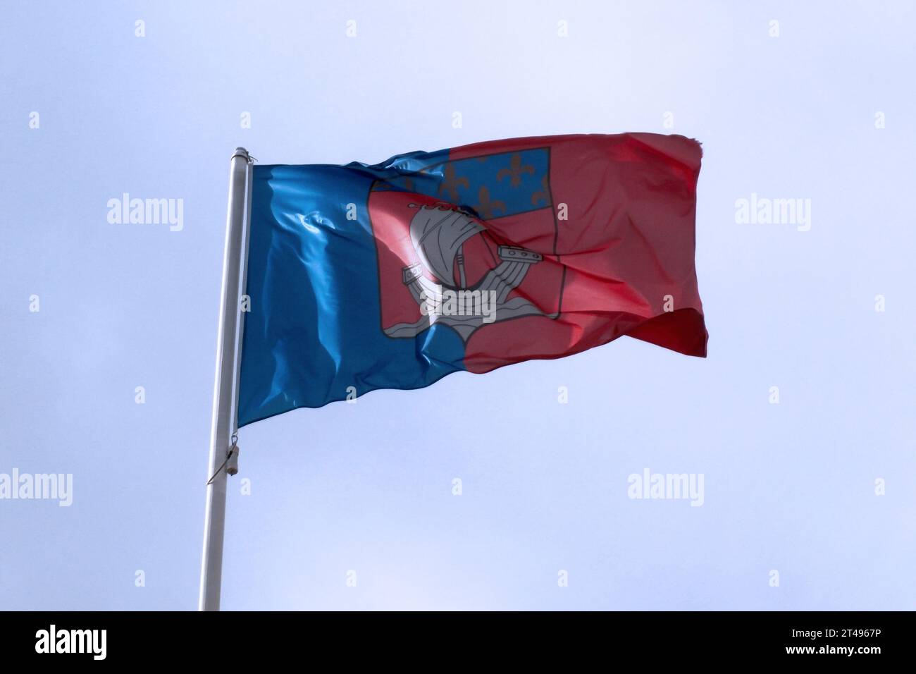 Flag of the city of Paris waving in mid air Stock Photo - Alamy