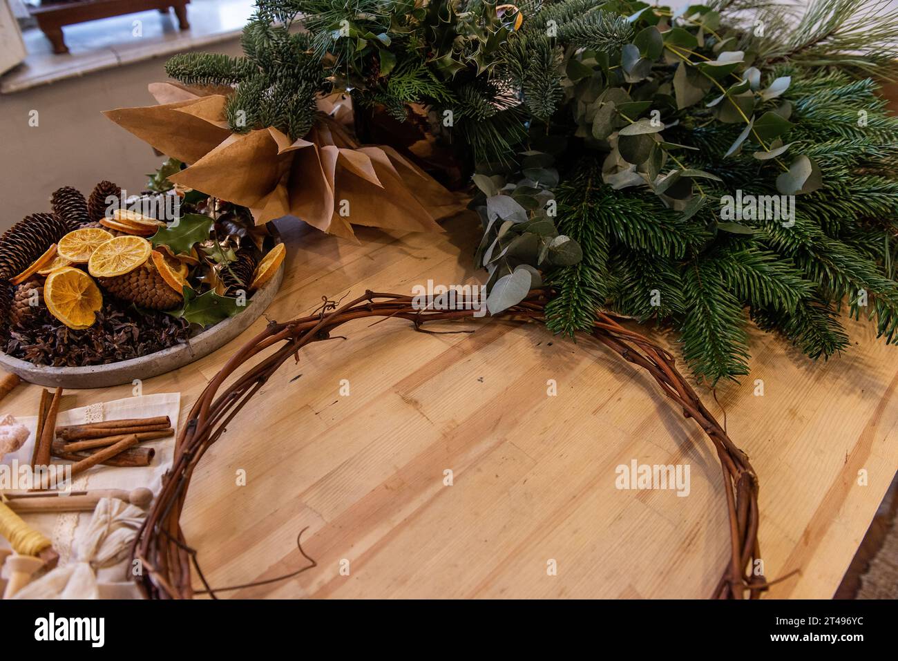 Master class, instructions, DIY how to make Christmas wreath for Advent. On wooden table: fir ...