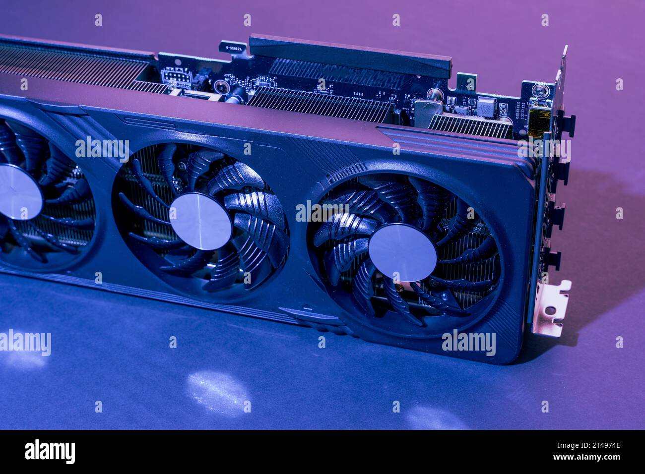 a modern powerful gaming graphics card for a computer with three fans ...