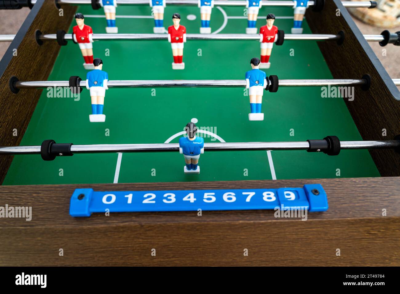 Table football. Close-up of figures of plastic players in a football ...