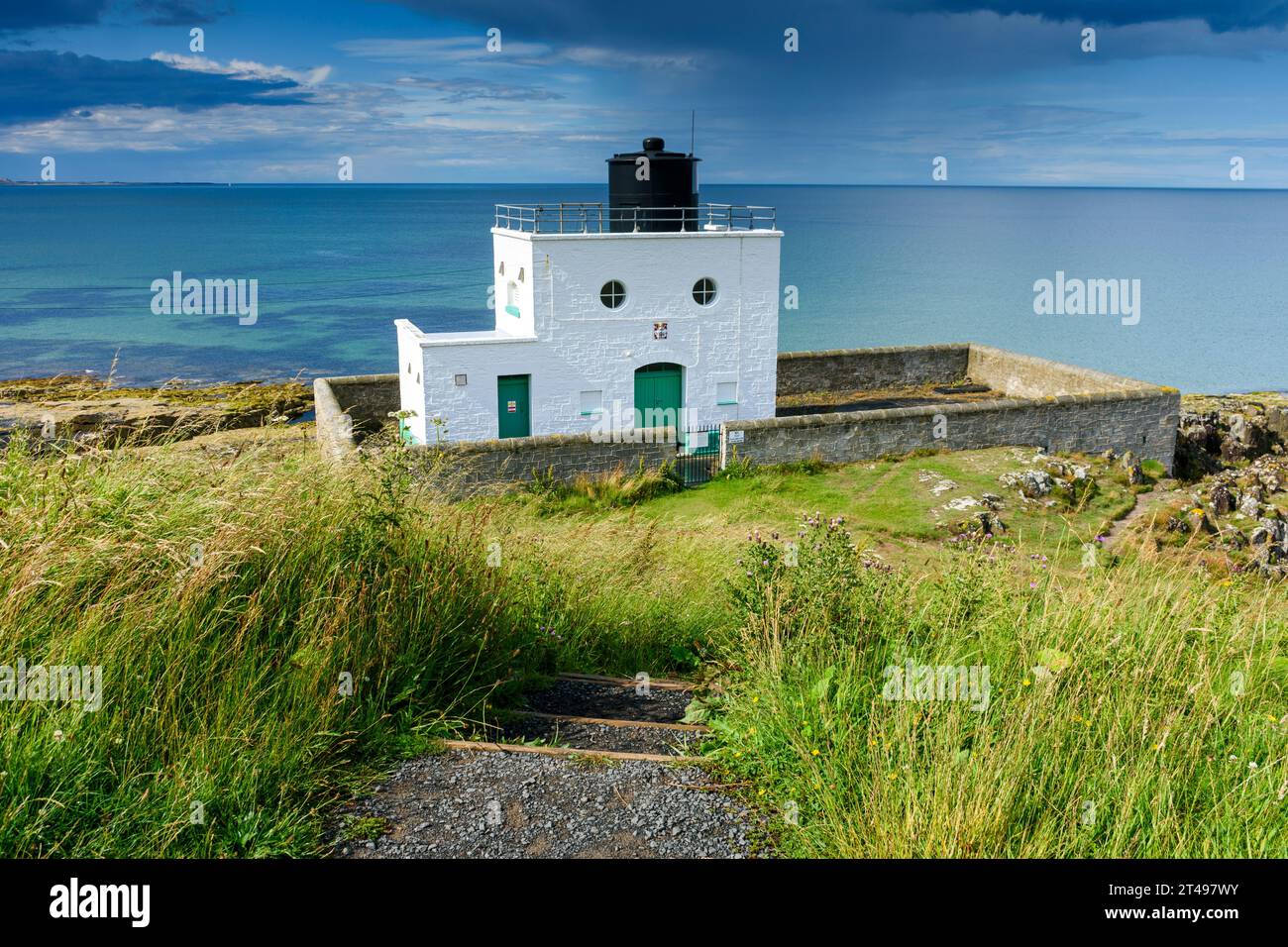 The lighthouse at Harkness Rocks, Bamburgh, Northumberland, England, UK ...