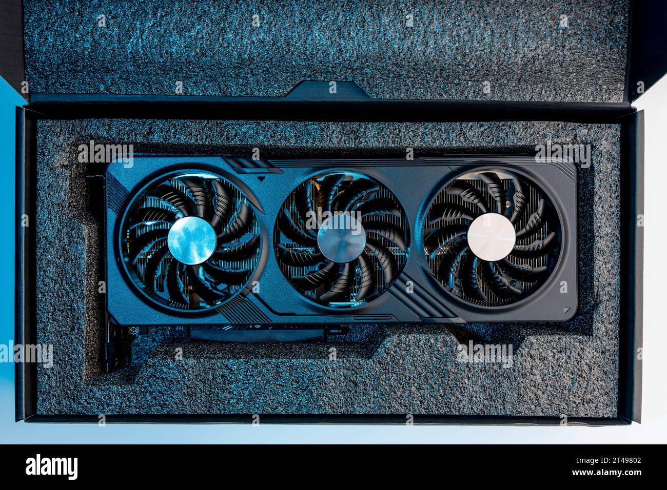 A modern, powerful gaming video card for a computer with three fans ...