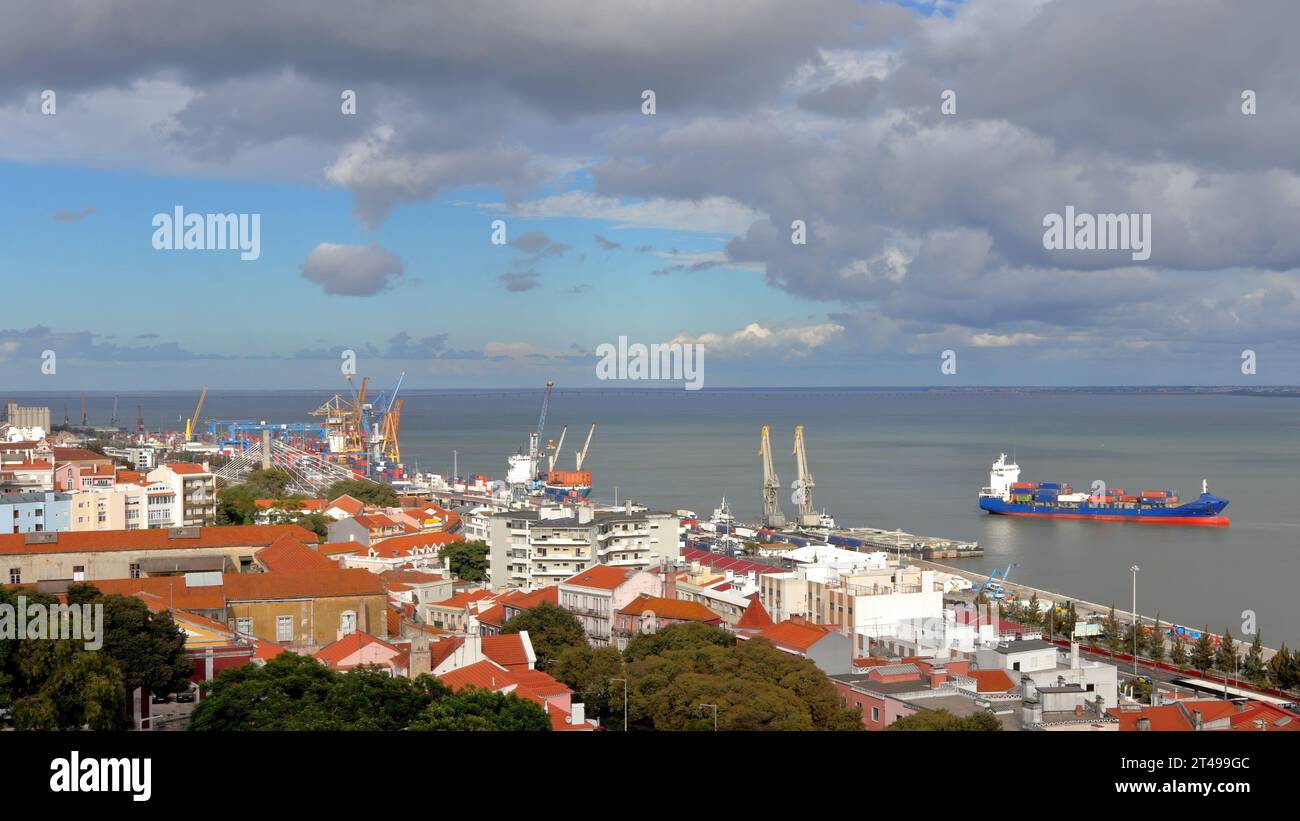 Aerial view of Lisbon sea port, red roofs and clouds in blue sky Stock ...