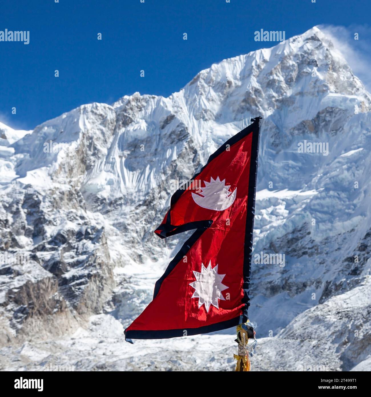 Flag of Nepal in Himalayas with snowy mountain background on Everest ...