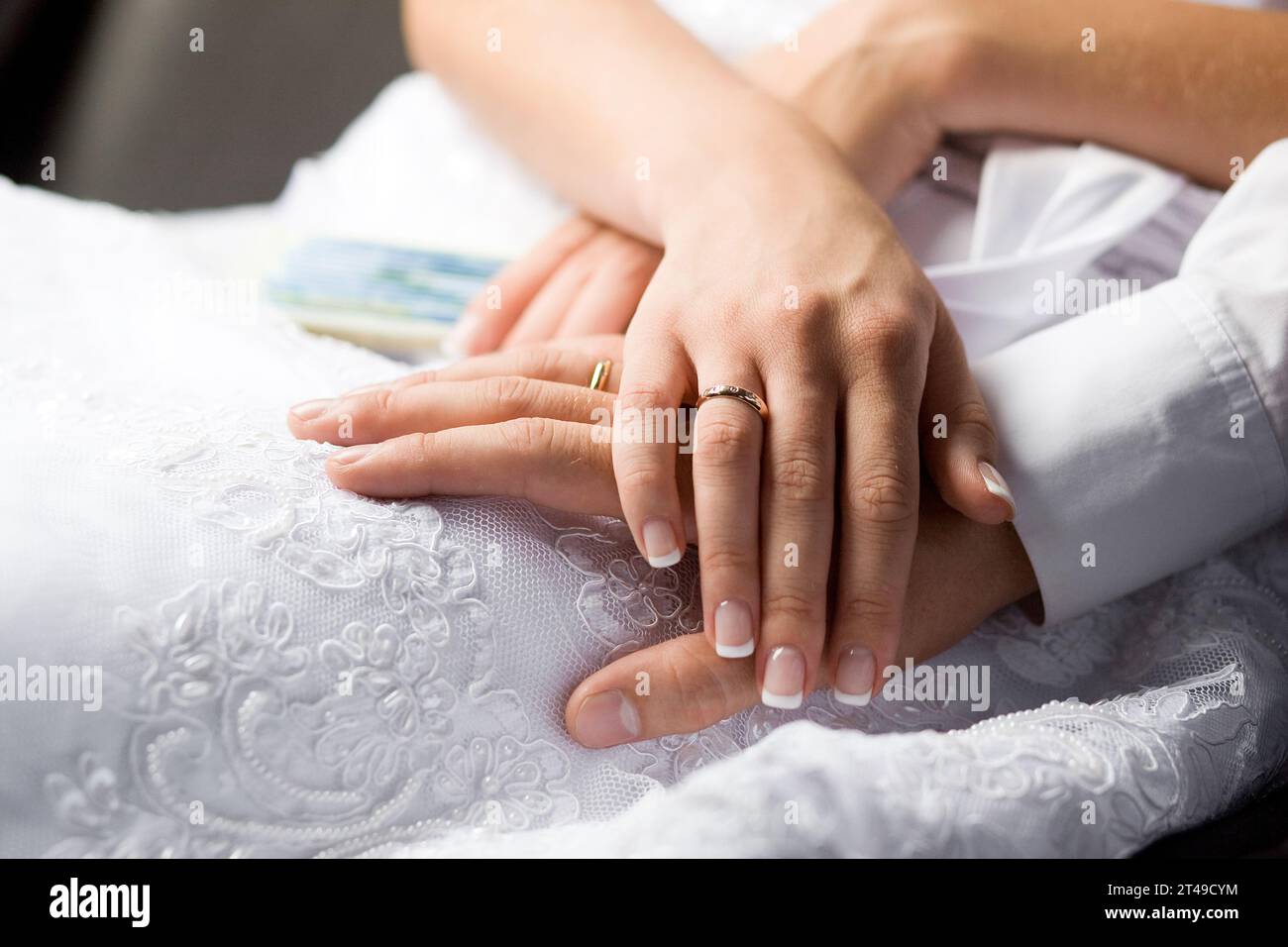 Intertwined hands hi-res stock photography and images - Alamy