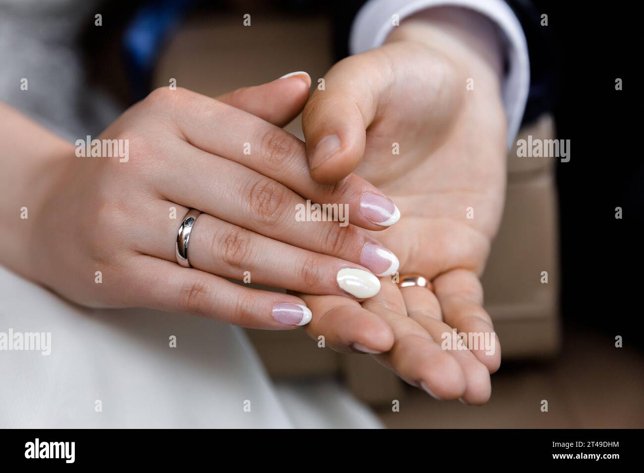 Intertwined hands hi-res stock photography and images - Alamy