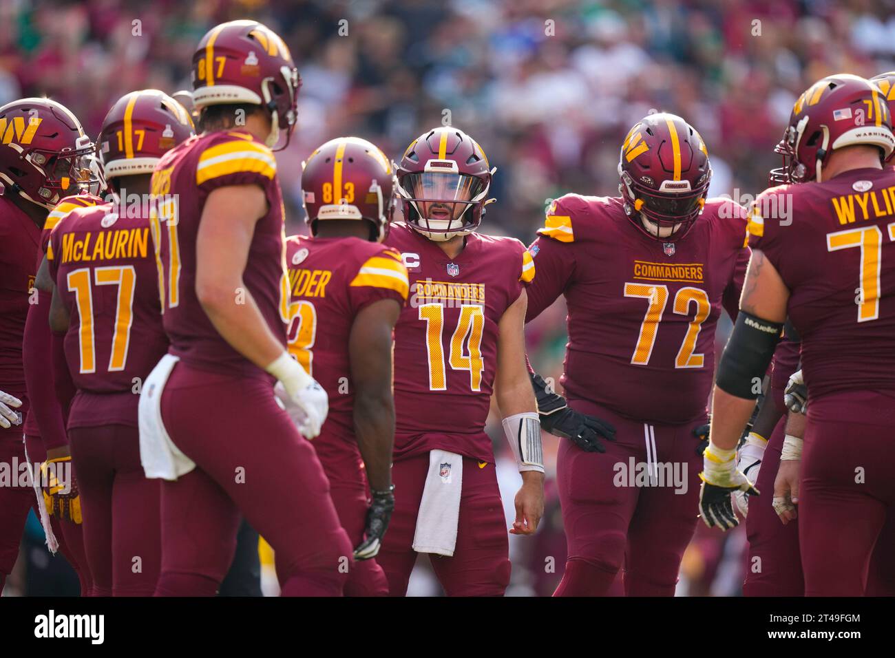 Washington Commanders quarterback Sam Howell (14) calls a play in the ...