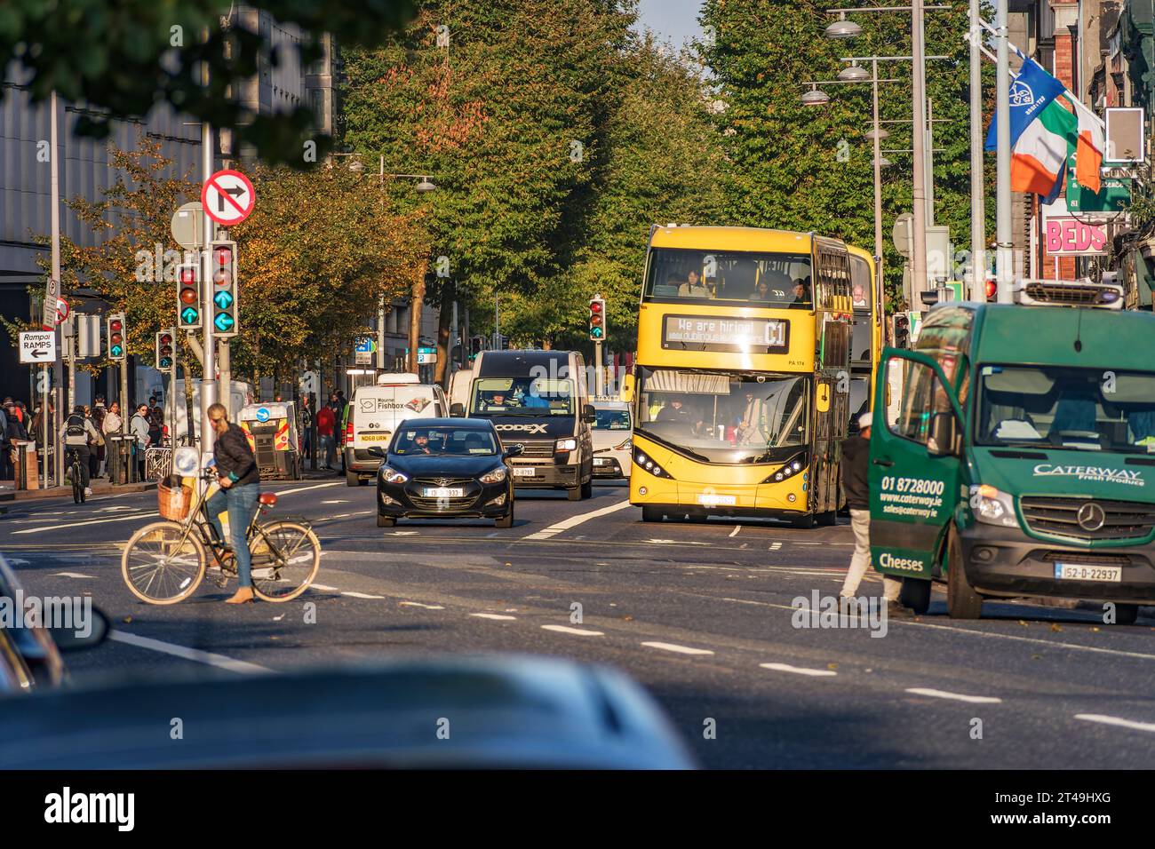 Buses, cyclist and traffic at Pearse Street in the morning, Dublin ...