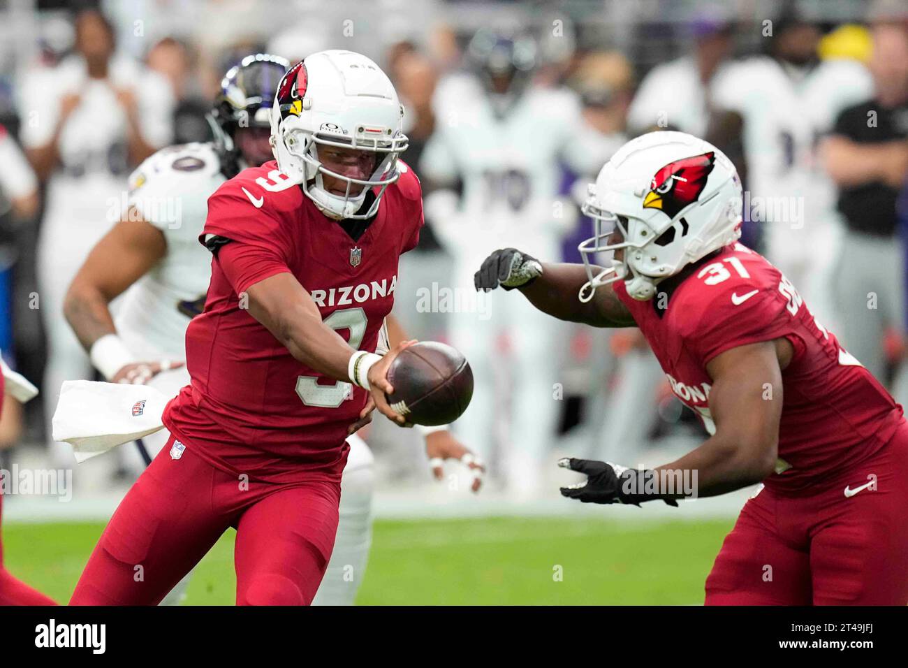 Arizona Cardinals quarterback Joshua Dobbs (9) hands the ball to ...