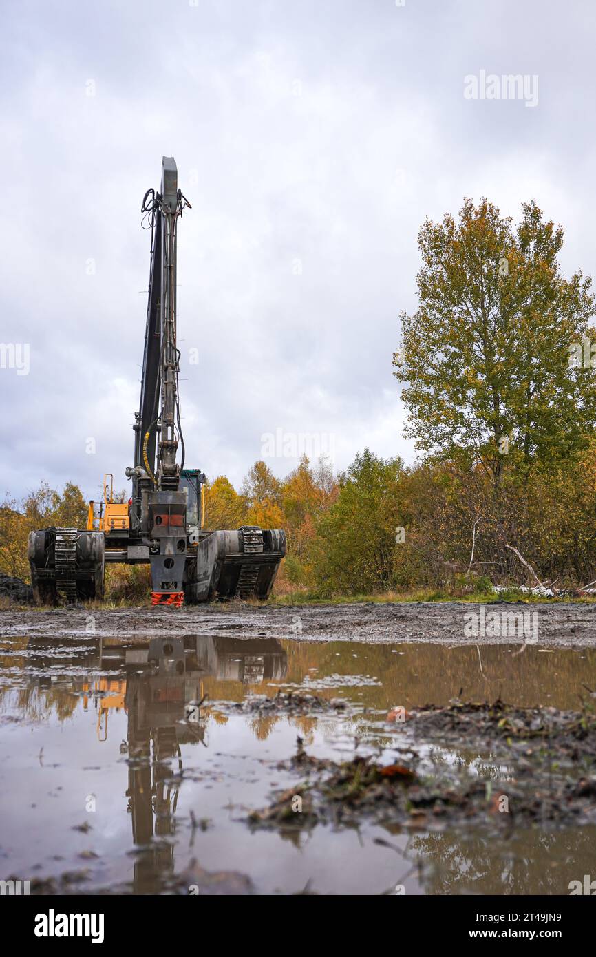 A large amphibious digger machine Stock Photo - Alamy