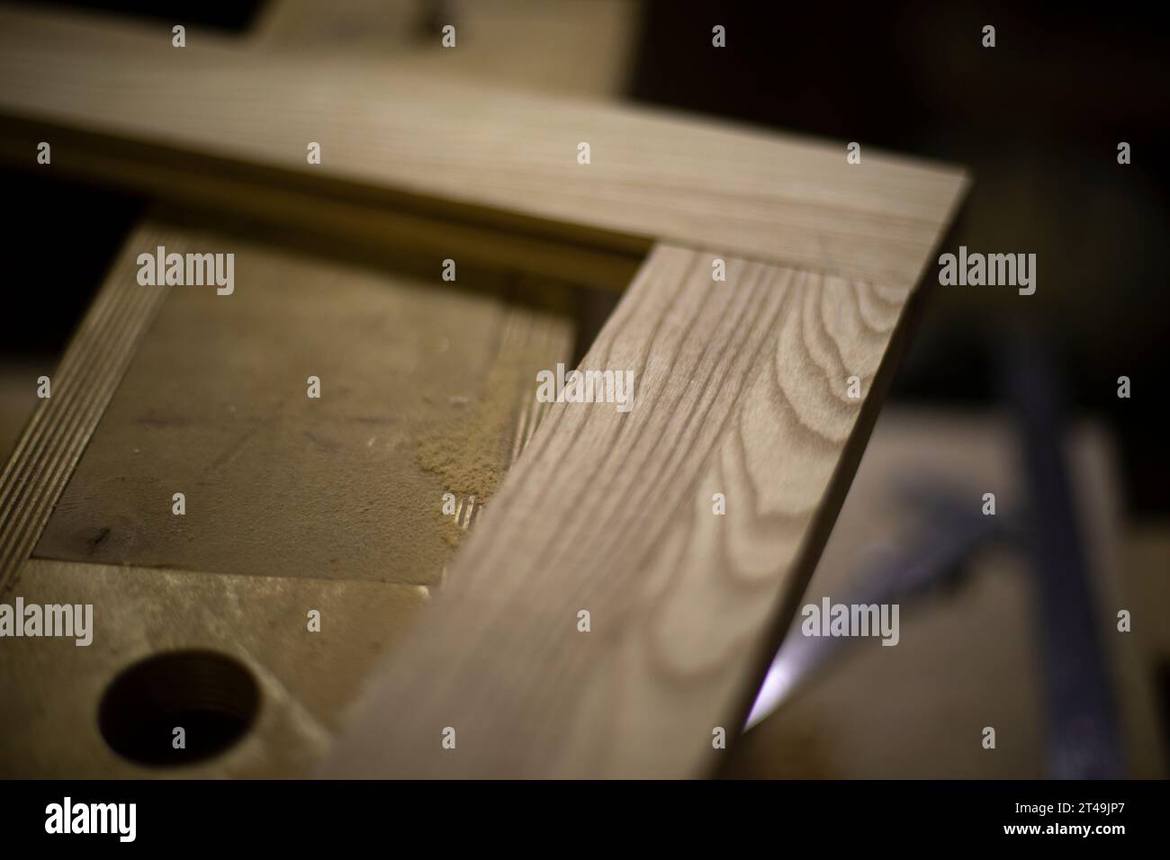 Joinery. Details of work. Wood processing. Polished board Stock Photo ...