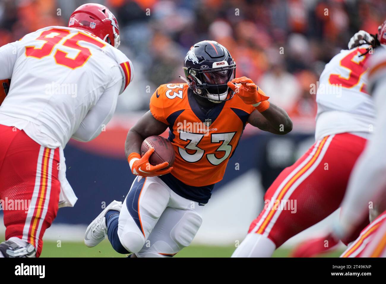 Denver Broncos running back Javonte Williams (33) runs with the ball ...
