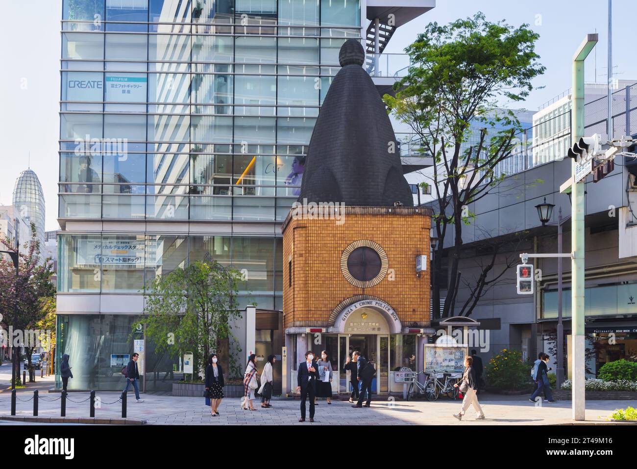 Tokyo, Japan - April 10, 2023: police box in front of office buildings ...