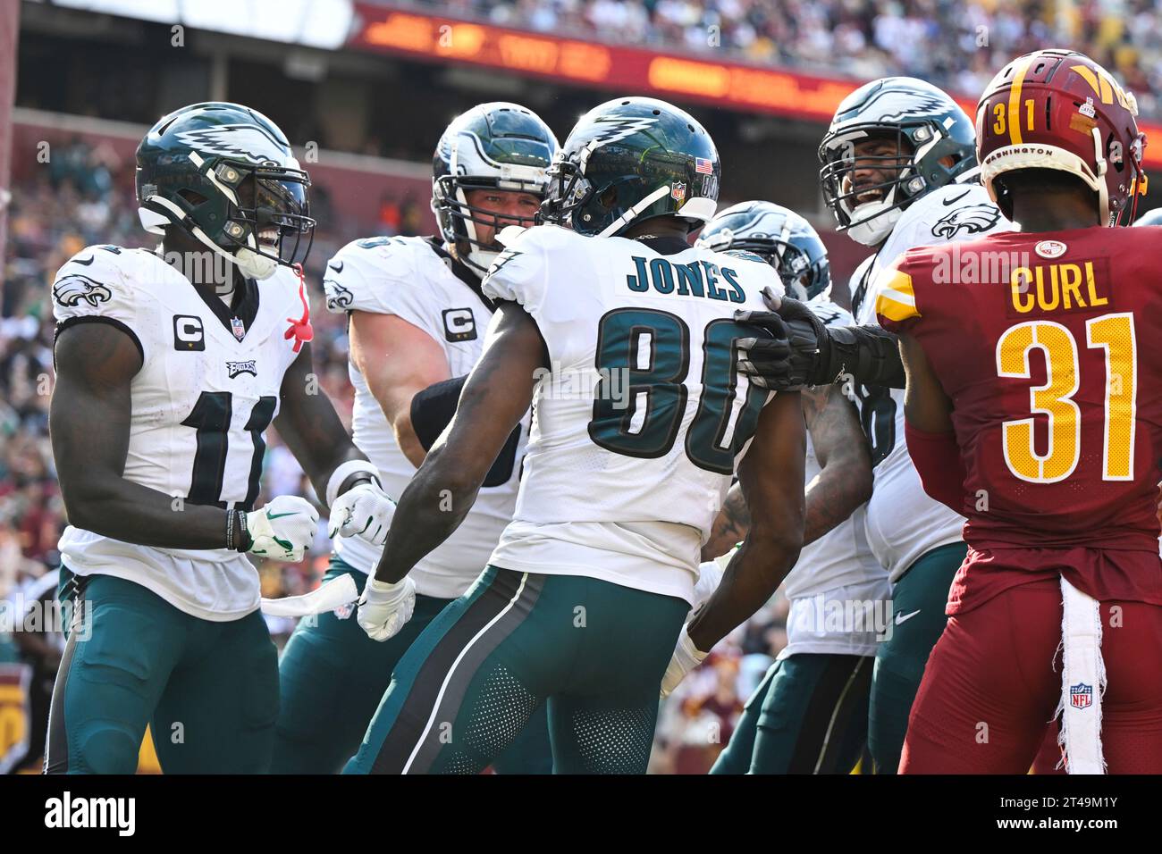 Philadelphia Eagles wide receiver Julio Jones (80) is greeted by ...