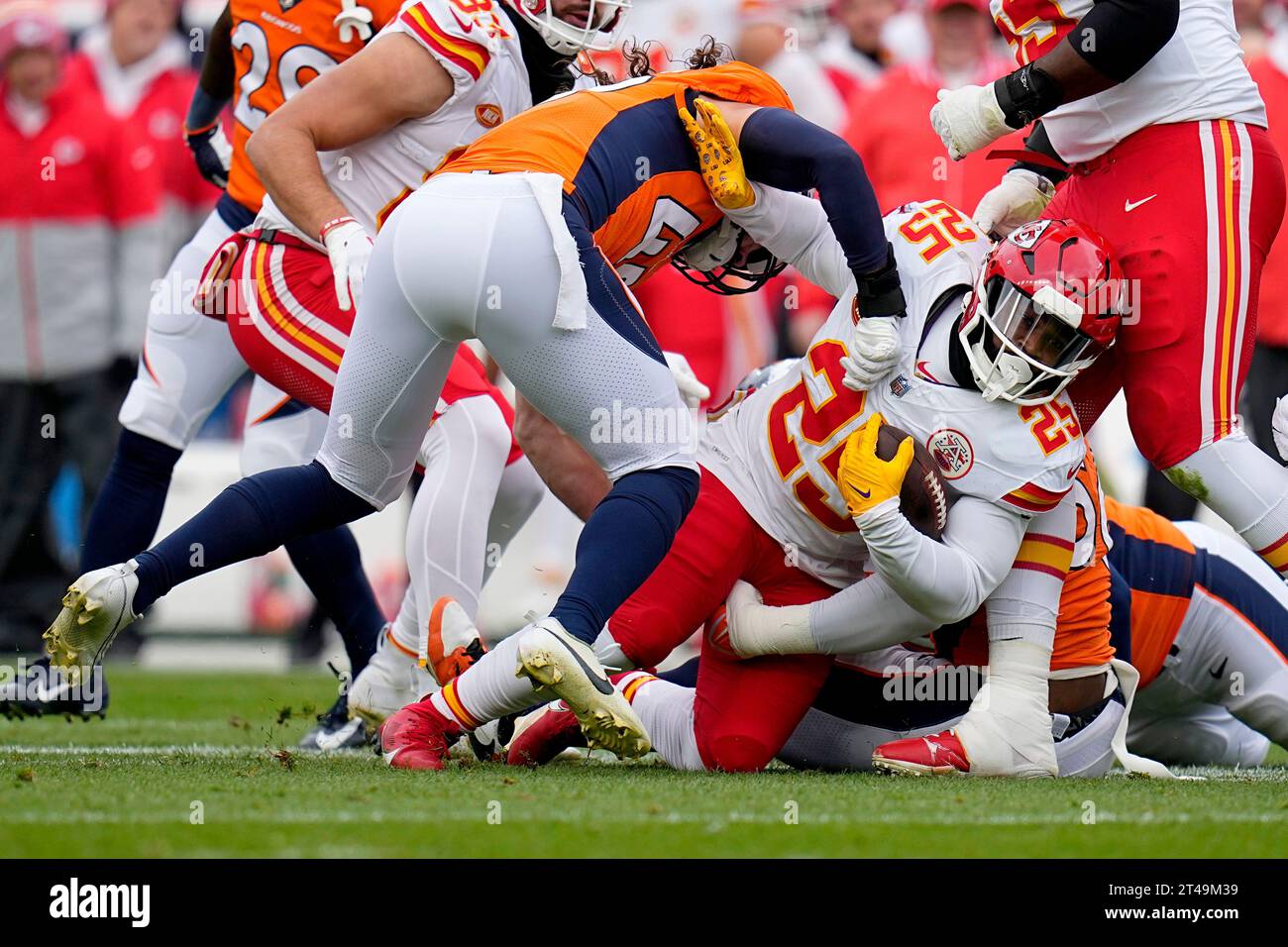 Kansas City Chiefs running back Clyde Edwards-Helaire (25) is stopped ...