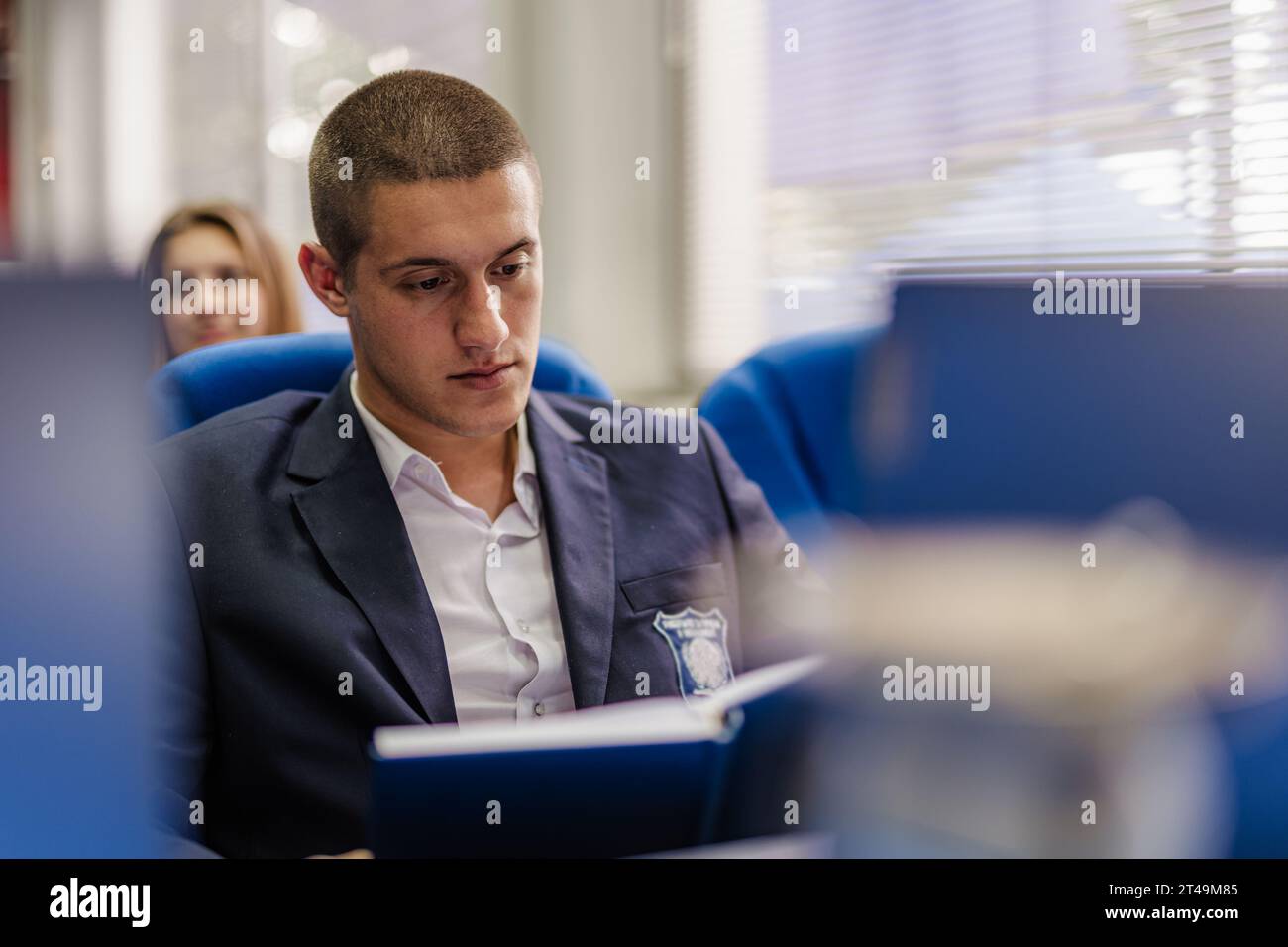 University student reviewing lectures a couple of minutes before the ...