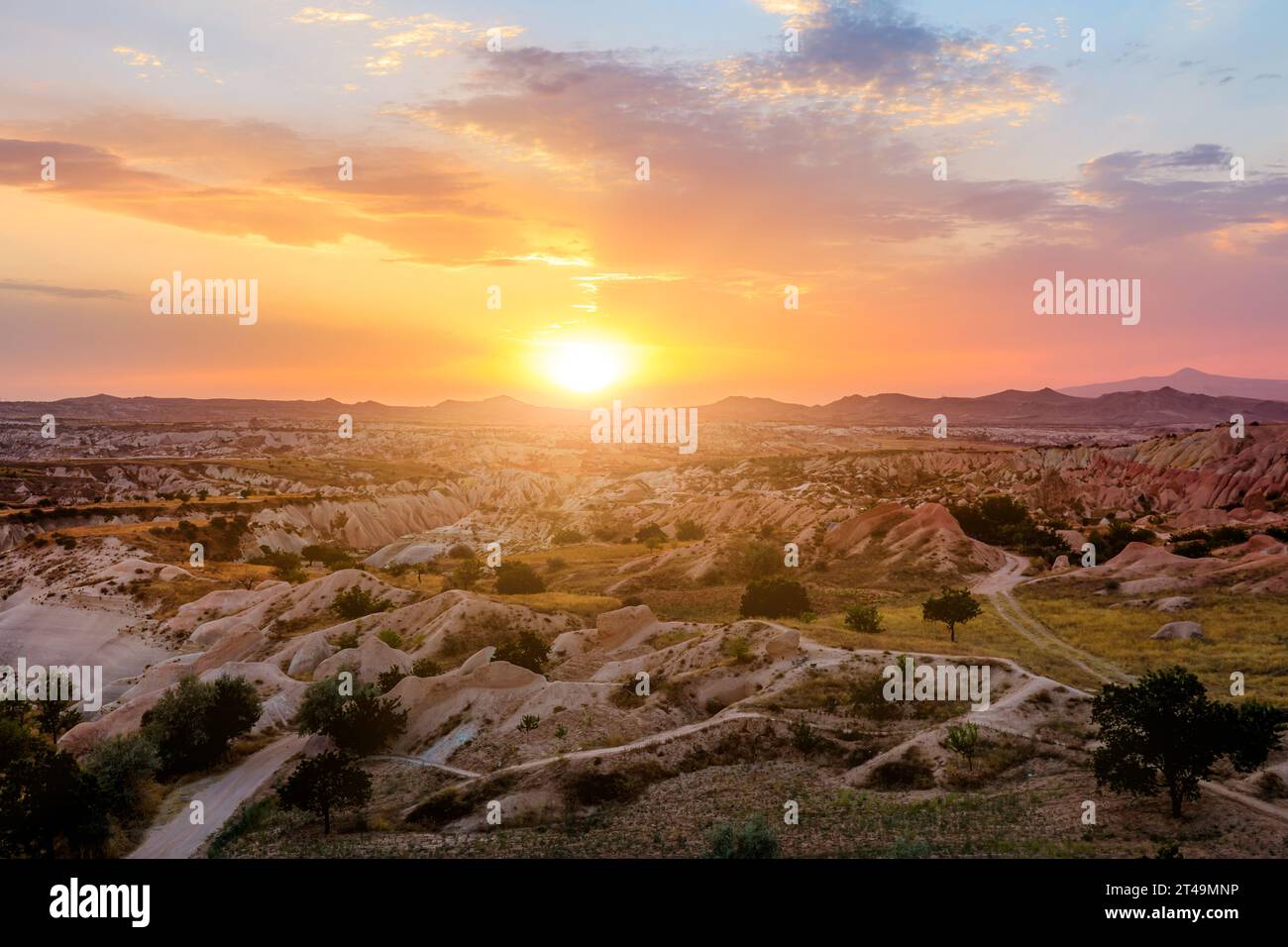 Cappadocia sunset with vibrant colors, captures the final beams of ...