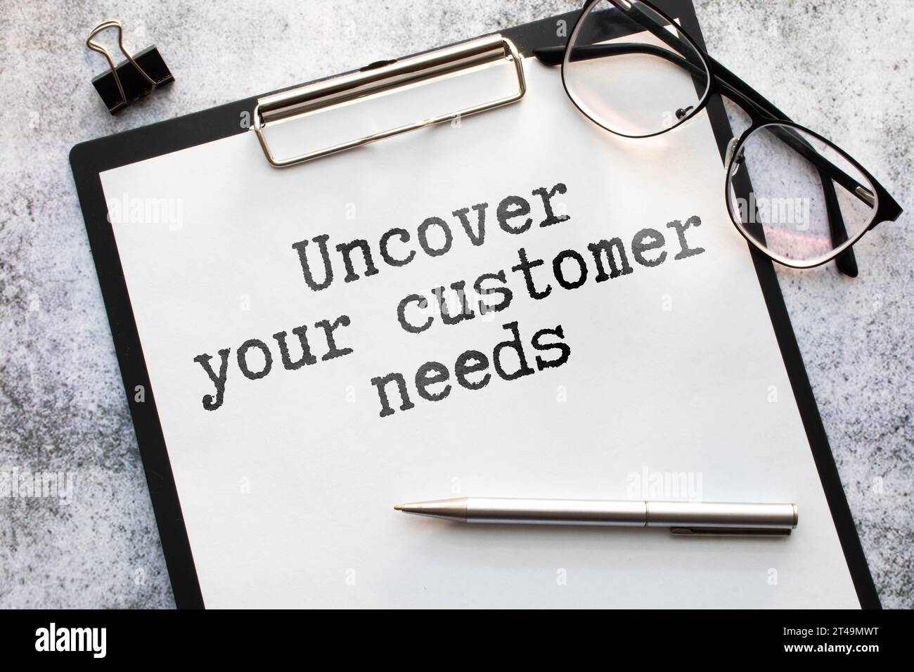 Uncover Your Customer Needs . gray and yellow background. text on white ...