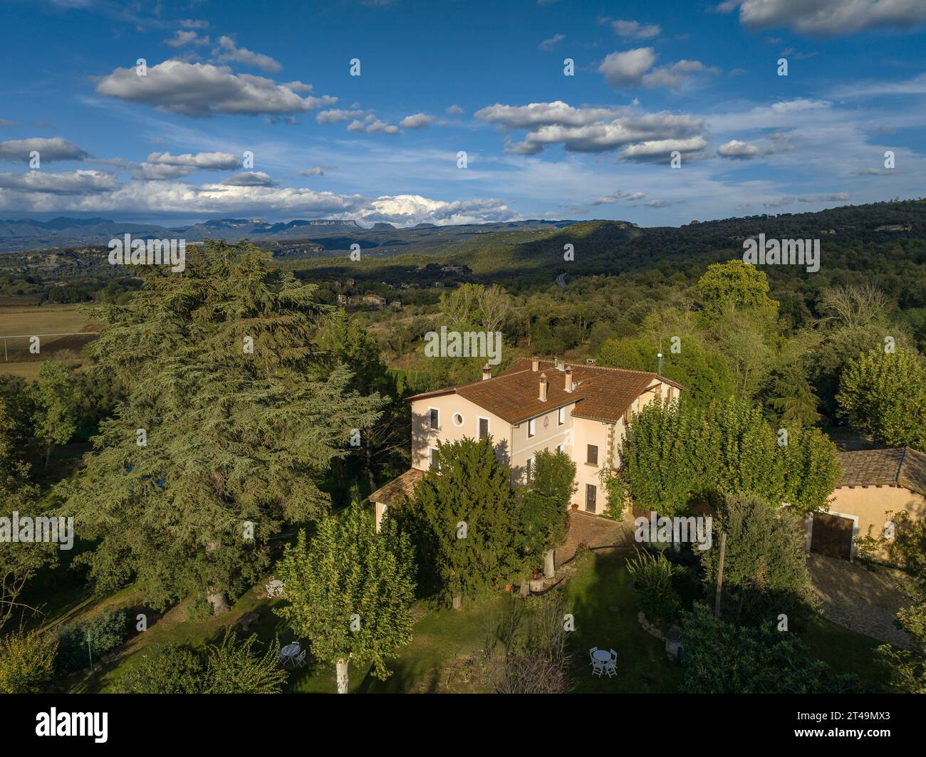 Aerial view of the Mas Torrents rural country house, in Tavèrnoles ...