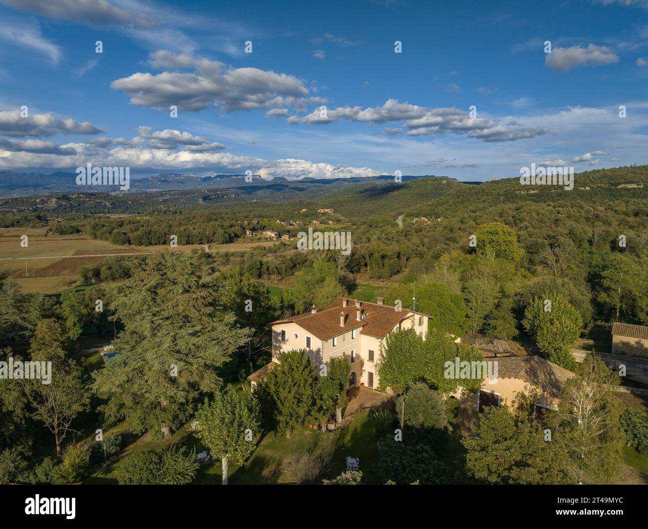 Aerial view of the Mas Torrents rural country house, in Tavèrnoles ...