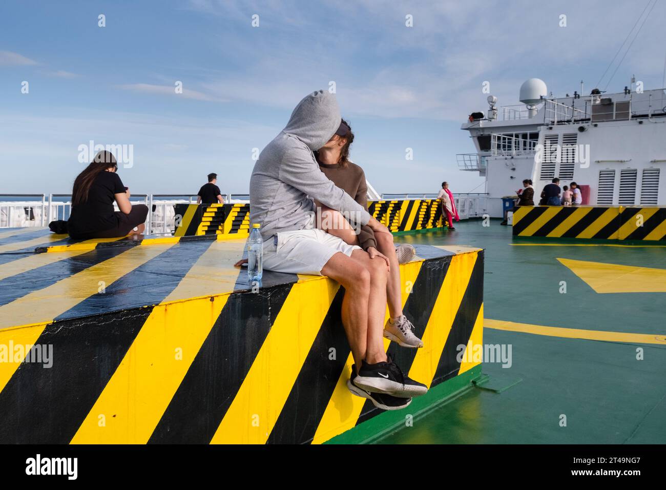 A couple kiss on a cruise ferry ship travelling on a Baltic Sea cruise ...