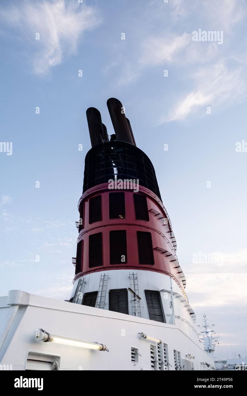 The funnel of a Viking Line cruise ferry ship in midnight summer sun ...